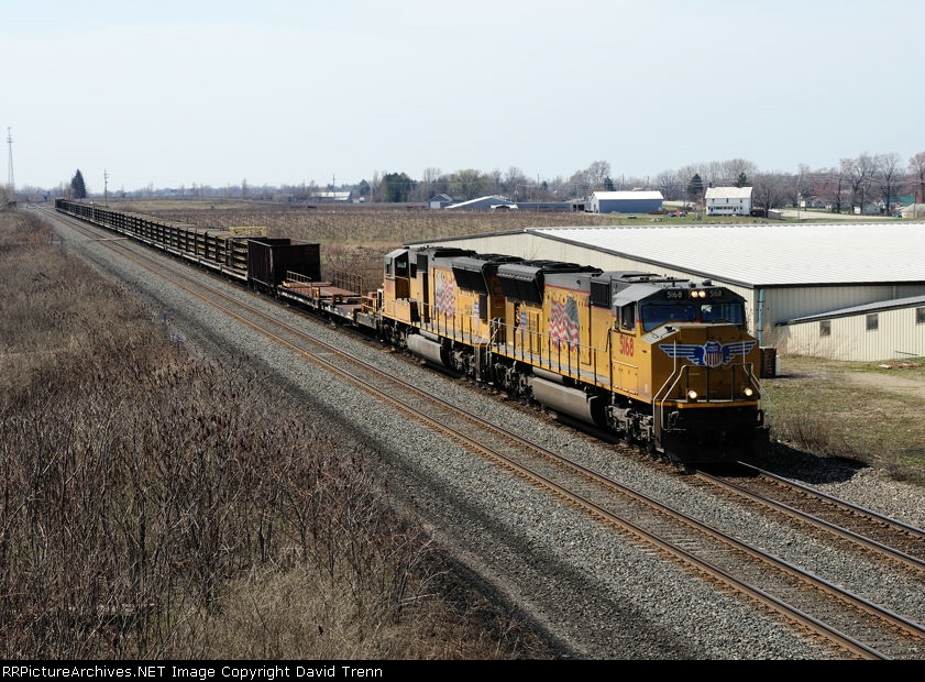 UP 5168 leads Eastbound CSX W946 at MP 70 on track number one.